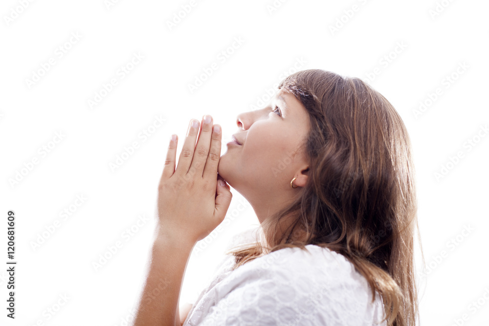 Niña rogando Stock Photo | Adobe Stock