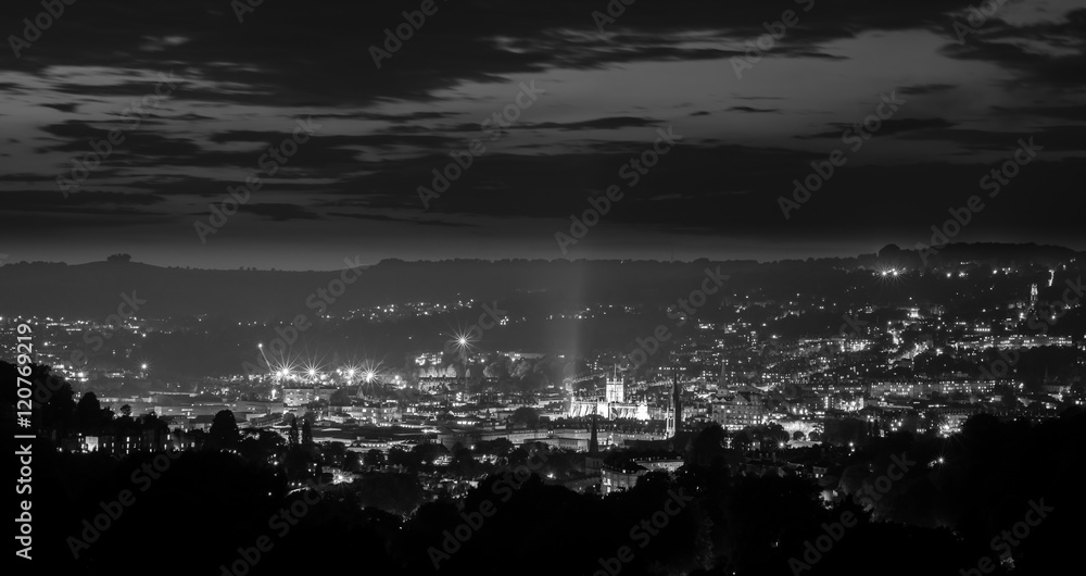 Panorama of Bath Abbey and city at night from above. High view of ...