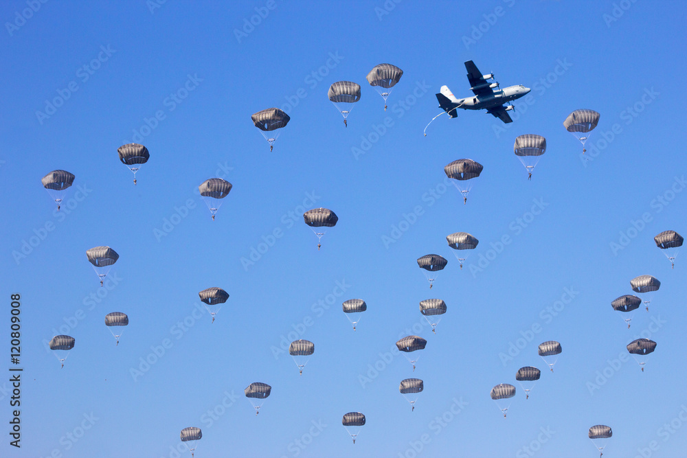 paratroopers jumping out of their planes Stock Photo | Adobe Stock