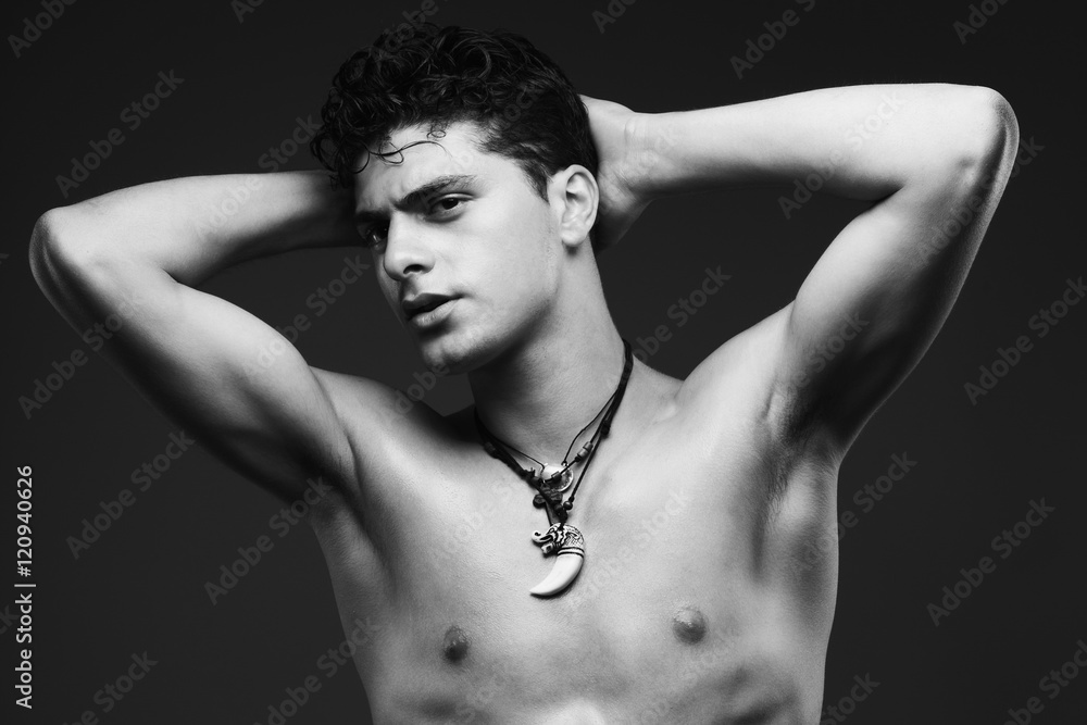 Male beauty concept. Handsome muscular male model with hands up Stock ...