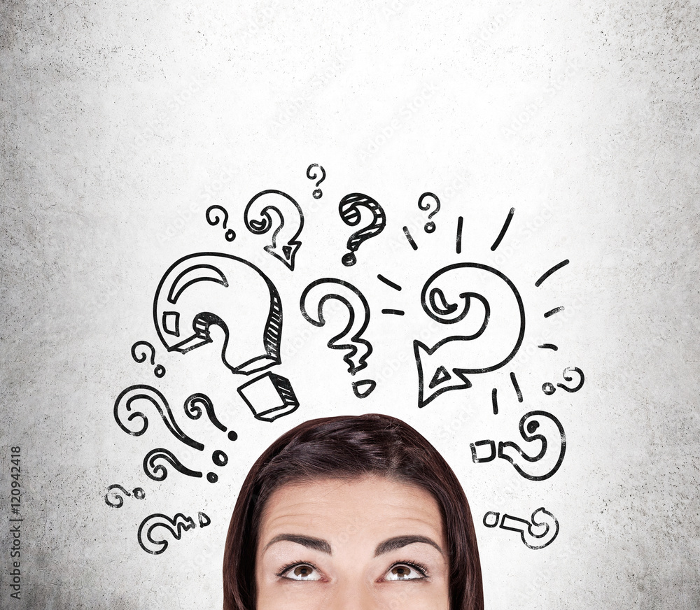 Young girl with dark hair and question marks Stock Photo | Adobe Stock
