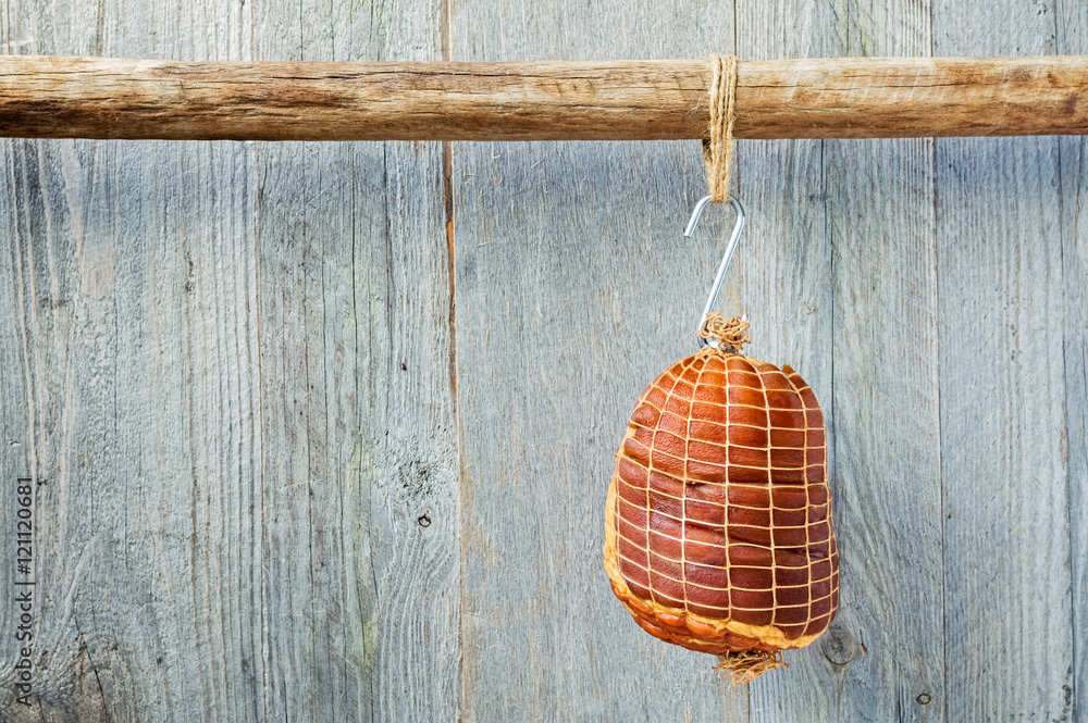 Hung Smoked Boneless Ham Hock Wrapped in Netting Stock Photo | Adobe Stock