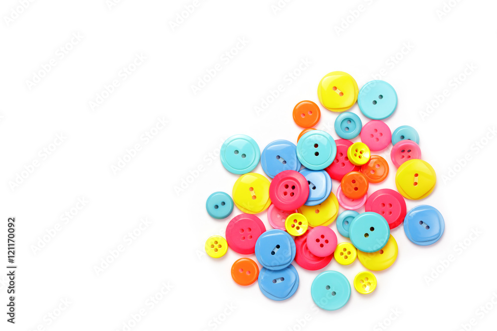 Colorful buttons stacked together on a white background Stock-Foto ...