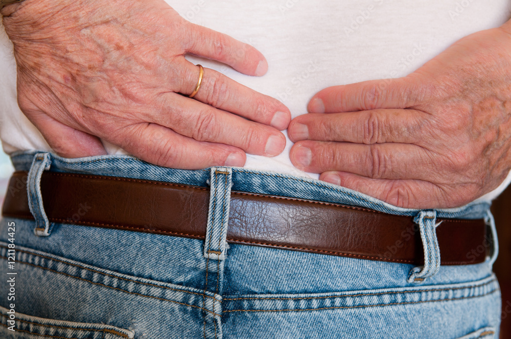 Backache. Close up of Man Placing his Hands on Lower Back as in Pain ...