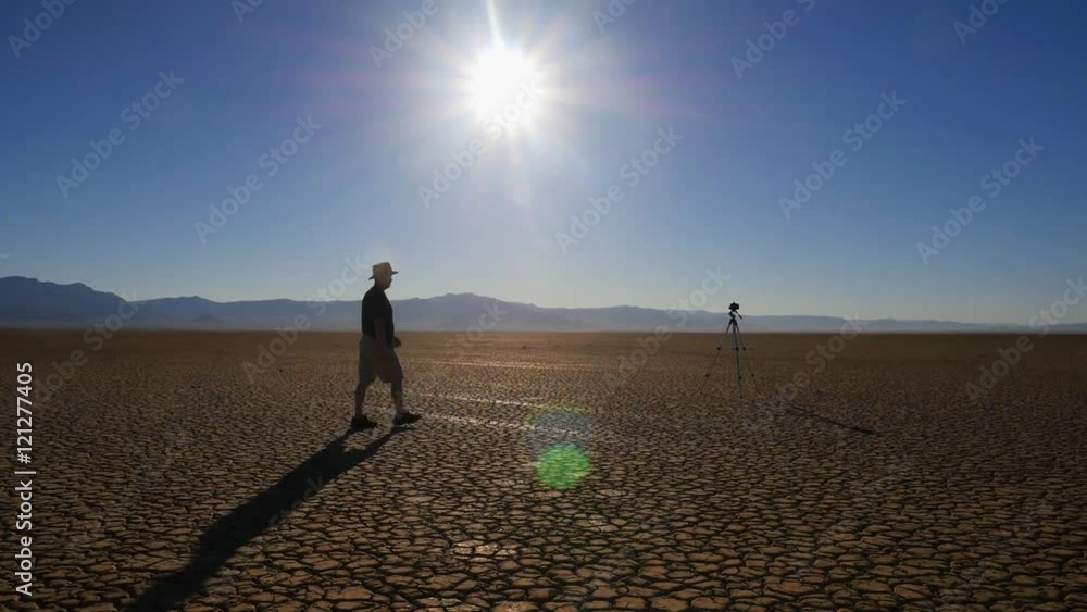 A man taking desert landscape photos with his camera Stock Video ...