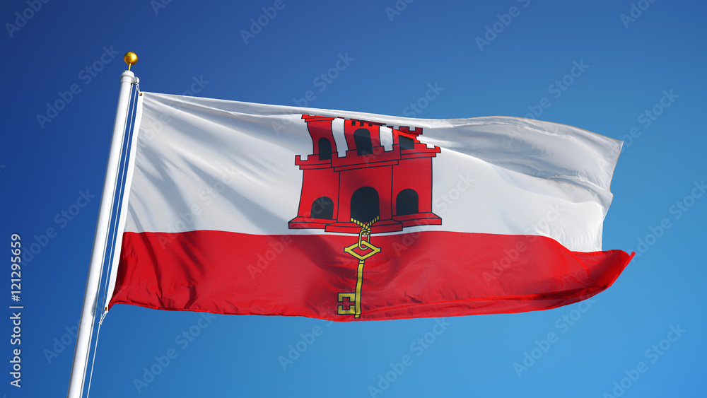 Gibraltar flag waving against clean blue sky, close up, isolated with ...