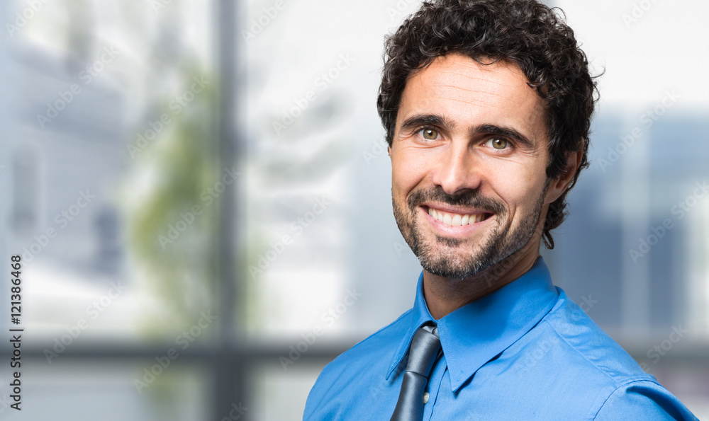 Smiling manager portrait Stock Photo | Adobe Stock