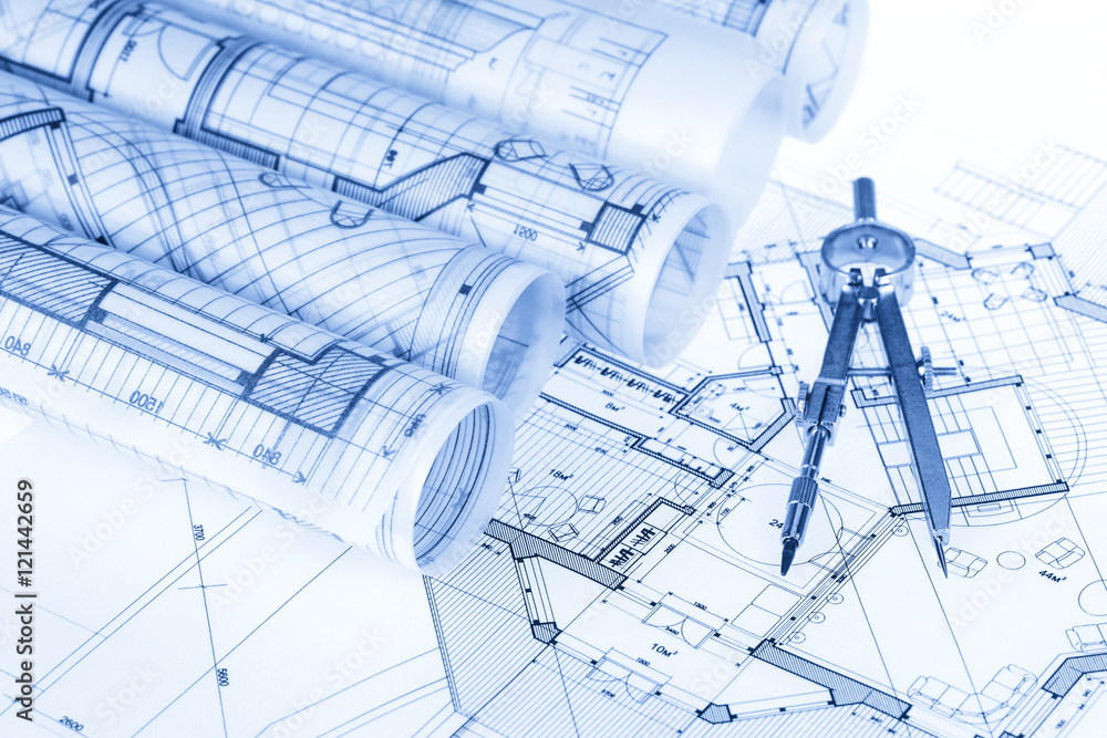 rolls of architecture blueprints, house plans & compass Stock Photo ...