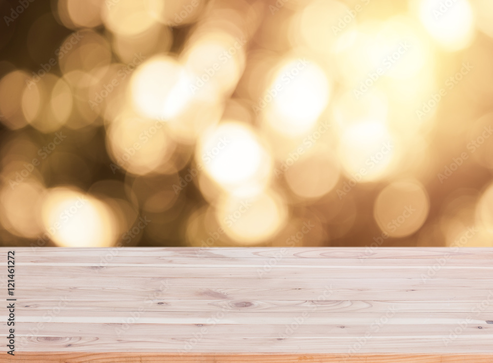 Wood table top on shiny bokeh gold background - can be used for display ...