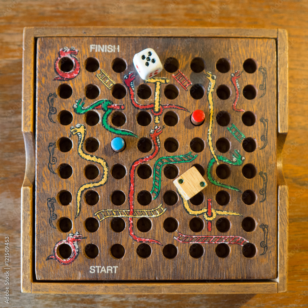 Snakes and Ladders wooden game Stock Photo | Adobe Stock