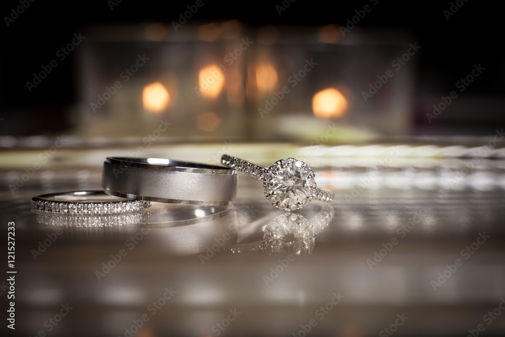 Wedding rings stacked on beautiful background Stock Photo | Adobe Stock
