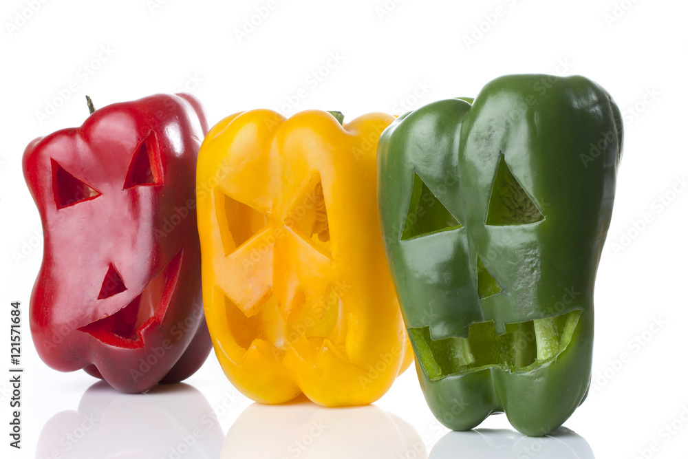 Food art creative concept. Halloween scary face carved into green ...