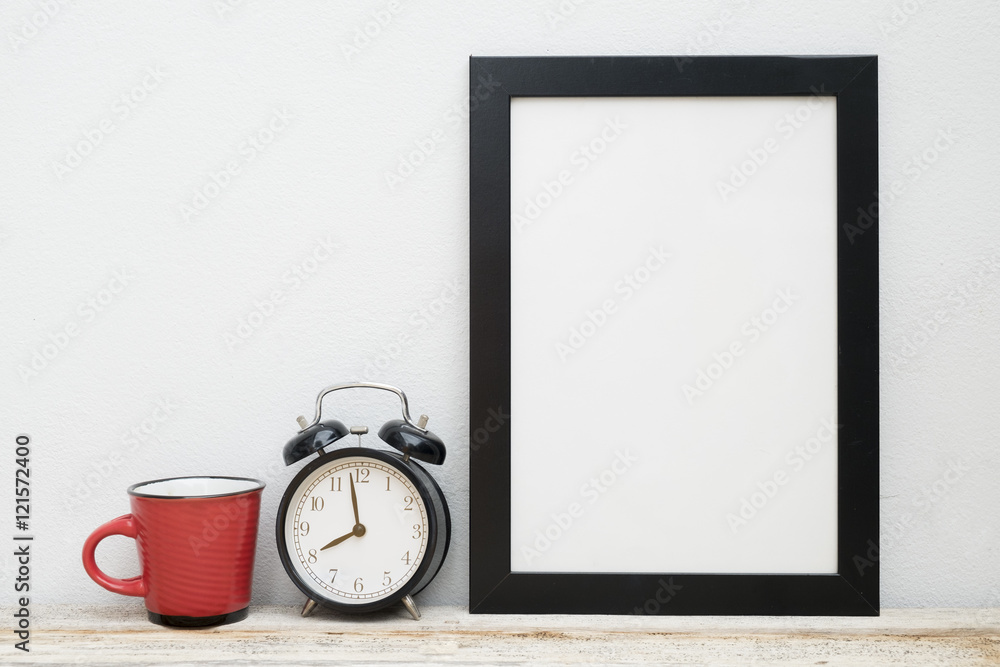 Blank Poster frame with coffee and clock in white wall and on wood ...