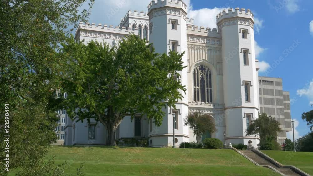 Scene moves up to reveal the historic old Louisiana state capital ...