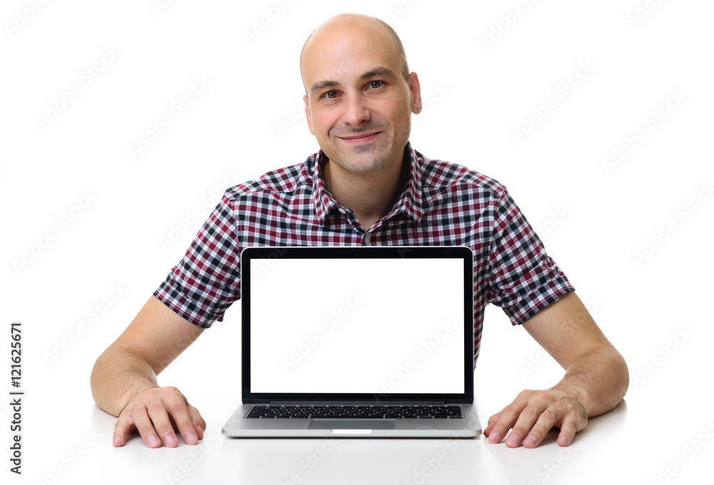 mid age bald man sitting at desk with laptop Stock Photo | Adobe Stock