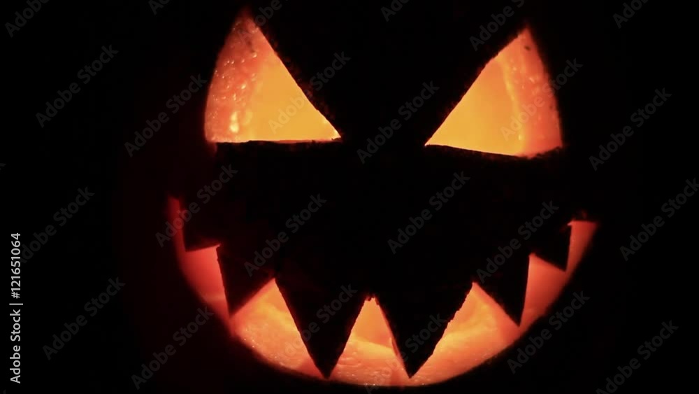 scary pumpkin faces smiling in the dark Stock Video | Adobe Stock