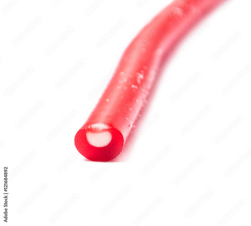Sweet jelly licorice candy stick red color isolated on white background ...