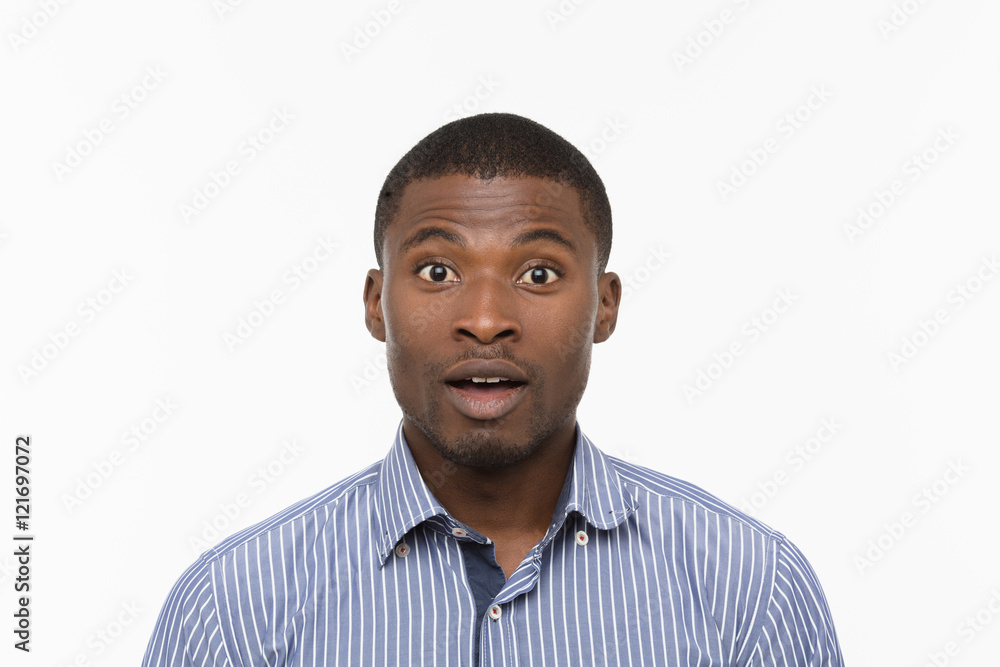 Emotions concept. Handsome Afro-American man showing surprised face to ...