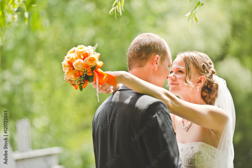 Happy groom and bride look at each other Stock Photo | Adobe Stock
