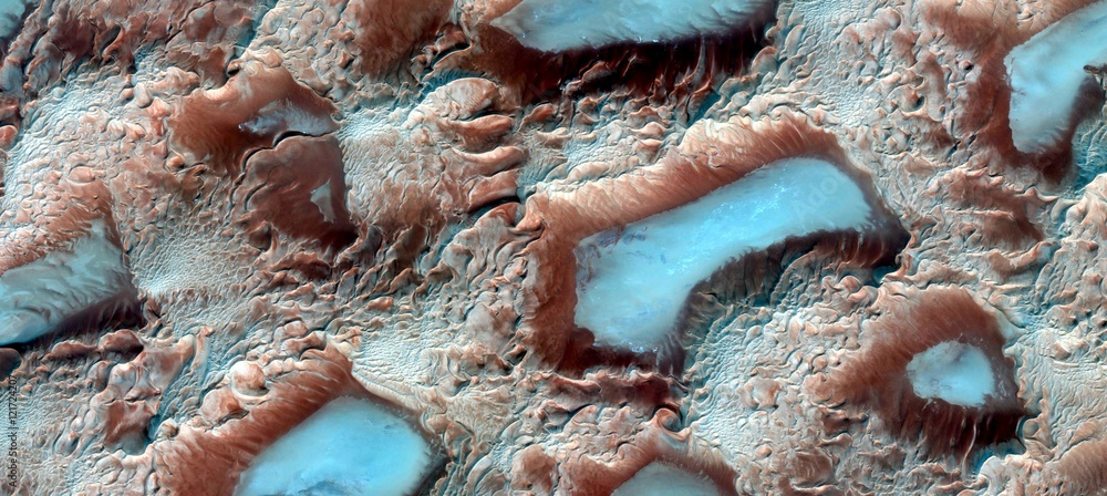 mirage turquoise lagoons between the dunes in the Sahara Desert ...