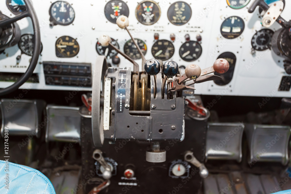 Engine Controls in the cockpit of an old airplane Stock Photo | Adobe Stock