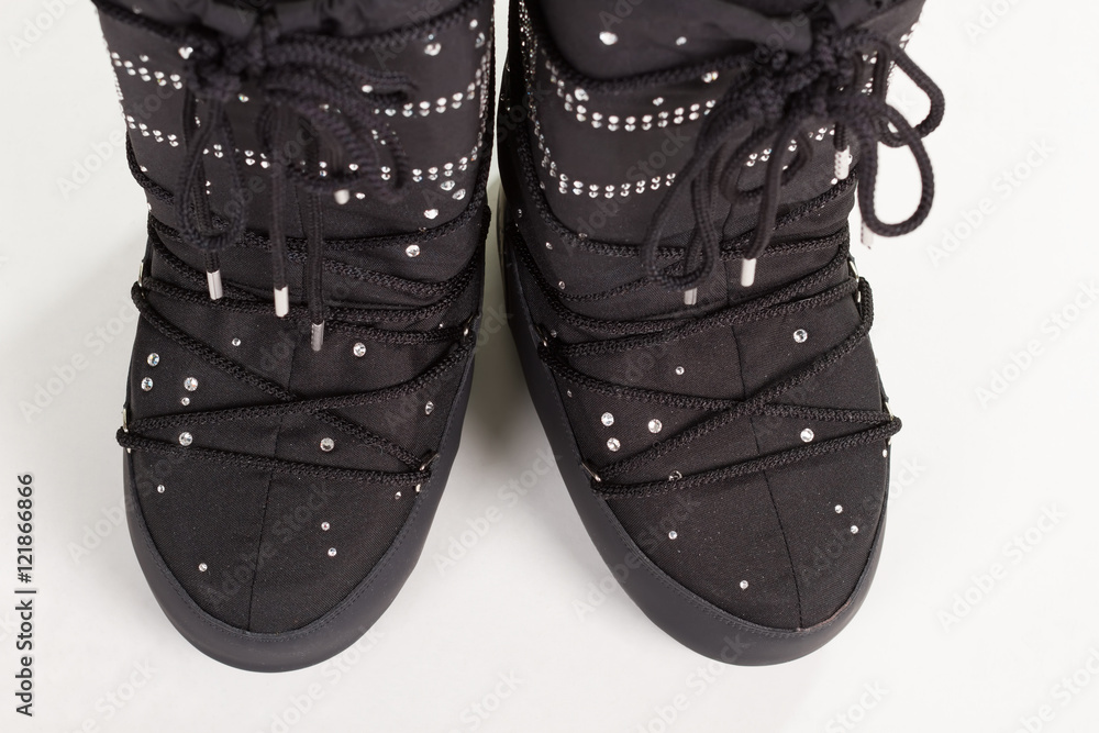 Funny winter moon boots on a white background. Stock Photo | Adobe Stock