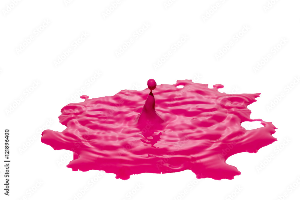 Impact of pink color water drop into a puddle of pink paint. All is ...