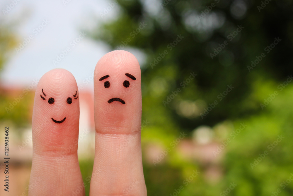 Finger art of couple. Woman is cheerful, man is sad. Stock Photo ...
