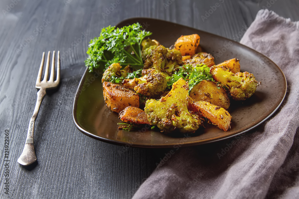 Traditional Indian Aloo Gobi fish with potato, cauliflower and s Stock ...