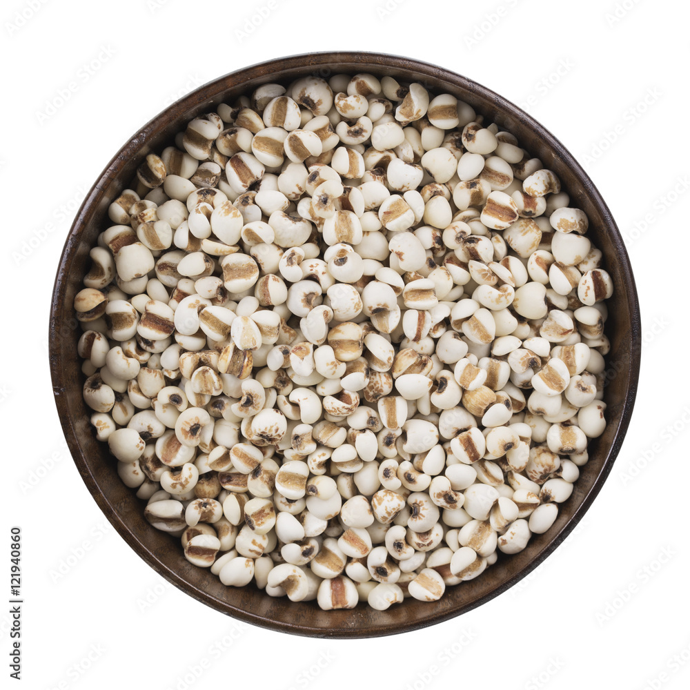 Job s Tears. Heap of organic brown rice in wooden bowl Stock Photo ...