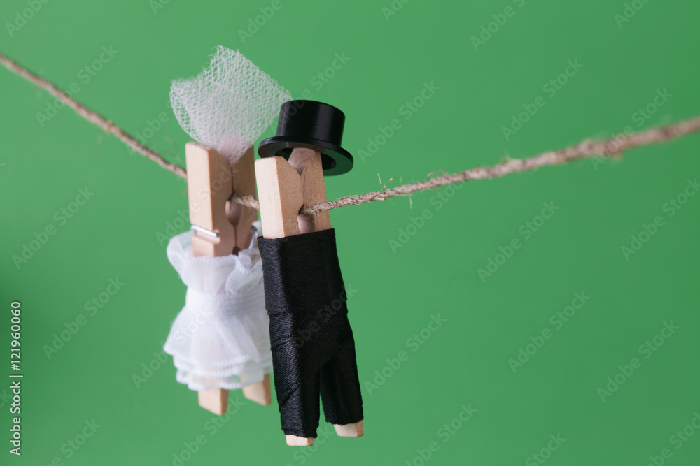 Clothespin characters on green background. Bride in white dress and ...
