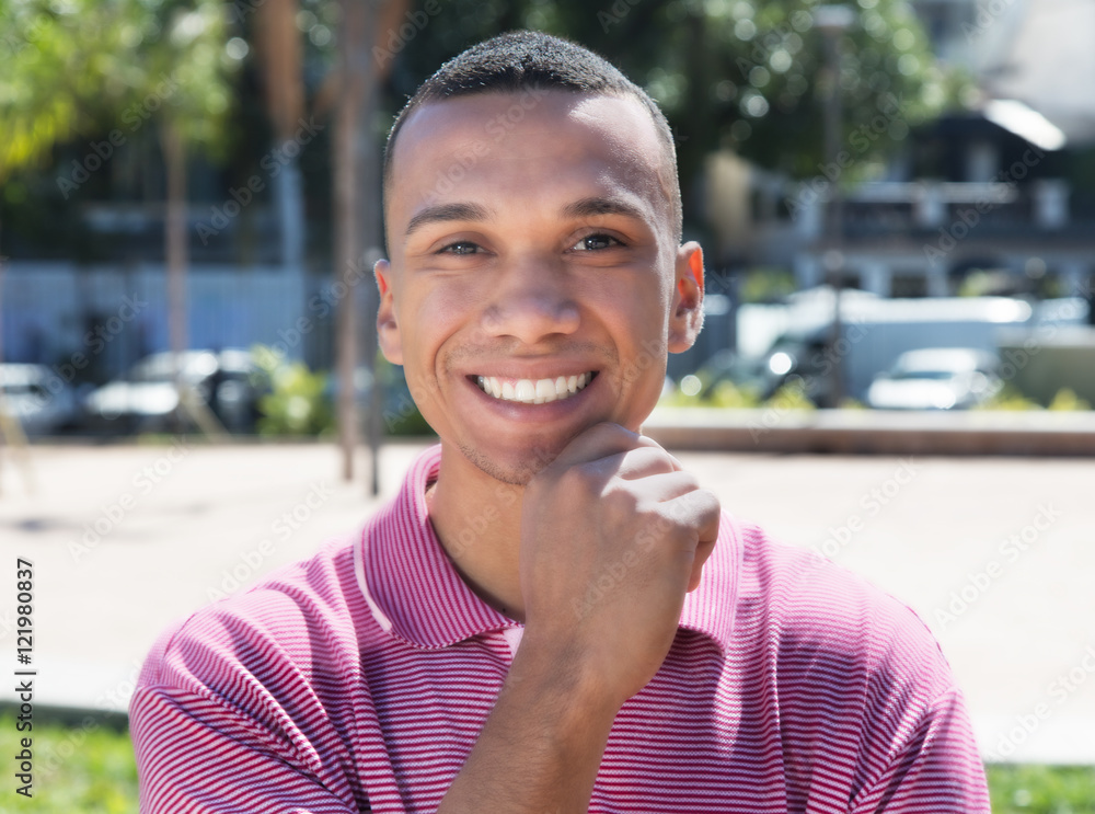 Laughing mexican guy in the city Stock Photo | Adobe Stock