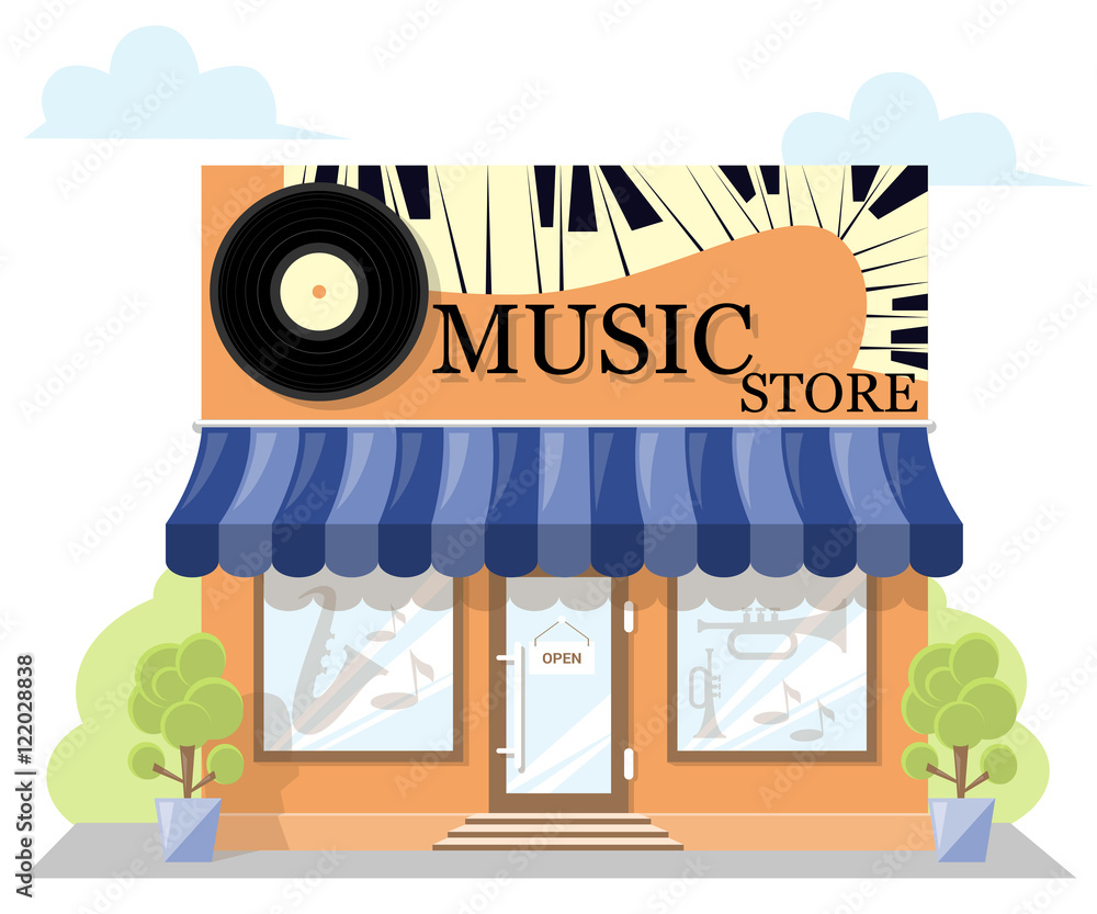 Facade music store with a signboard, awning and products in shopwindow ...