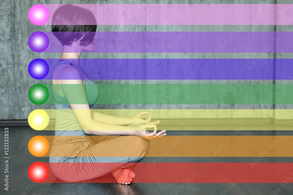 Woman practicing meditation with the chakras. Beautiful young woman ...