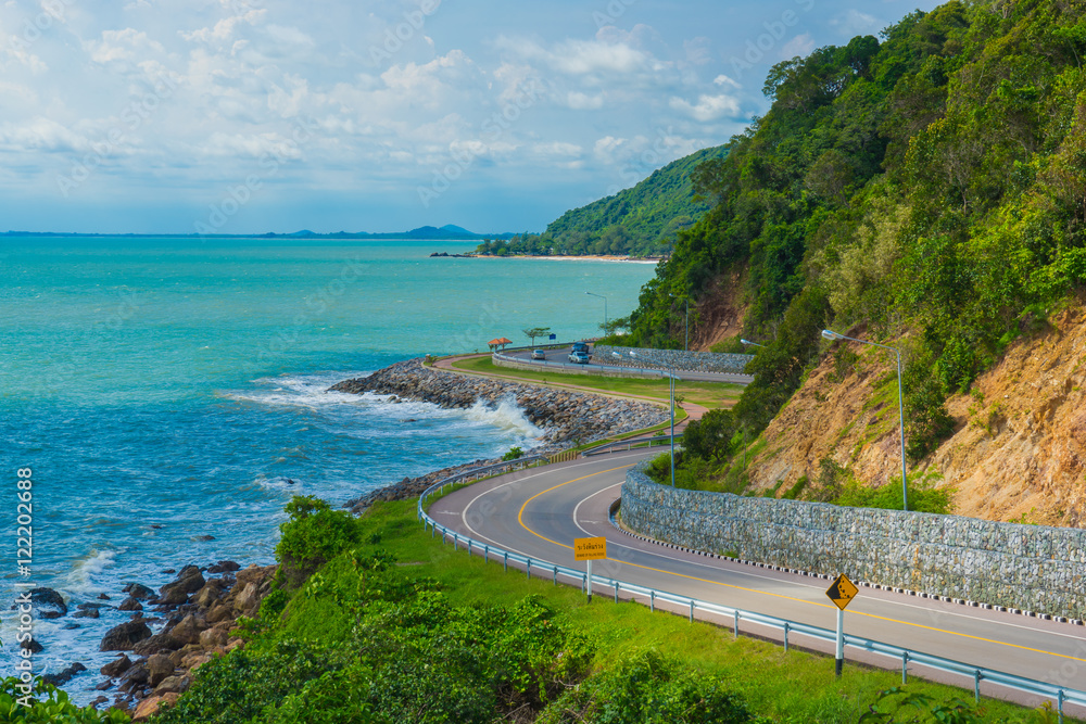 Beatiful curve road and sea with blue sky and clouds at Khung Wiman ...