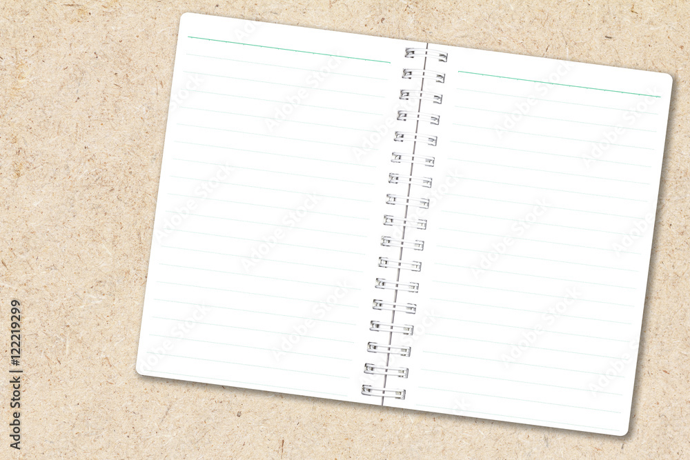 Open notebook paper with line on chipboard background for design with ...