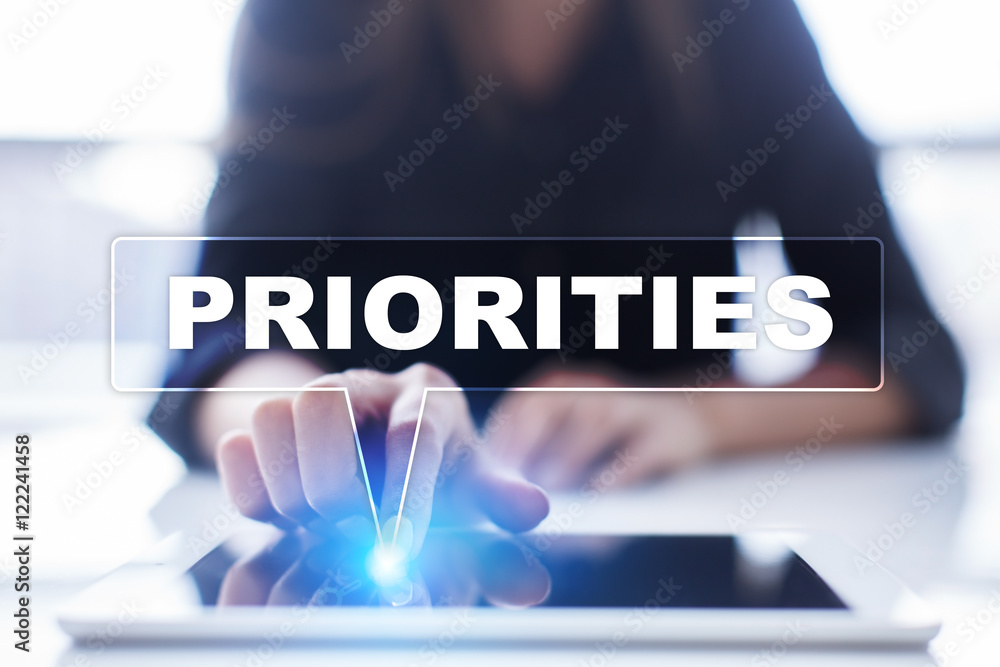 Woman is using tablet pc, pressing on virtual screen and selecting ...