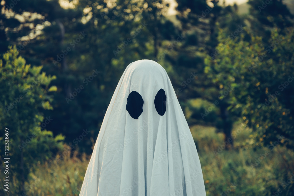 In costume of ghost Stock Photo | Adobe Stock