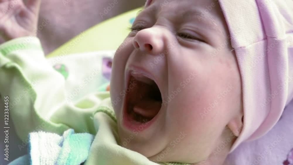 Close up of newborn baby crying in slow motion. Cute hungry child ...