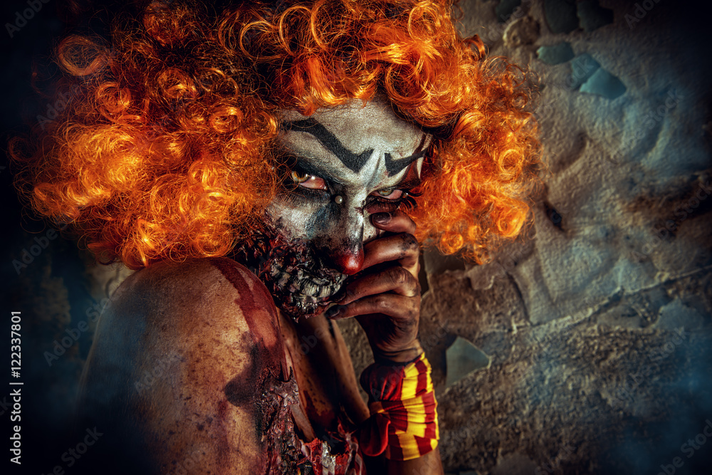 frightening clown Stock Photo | Adobe Stock