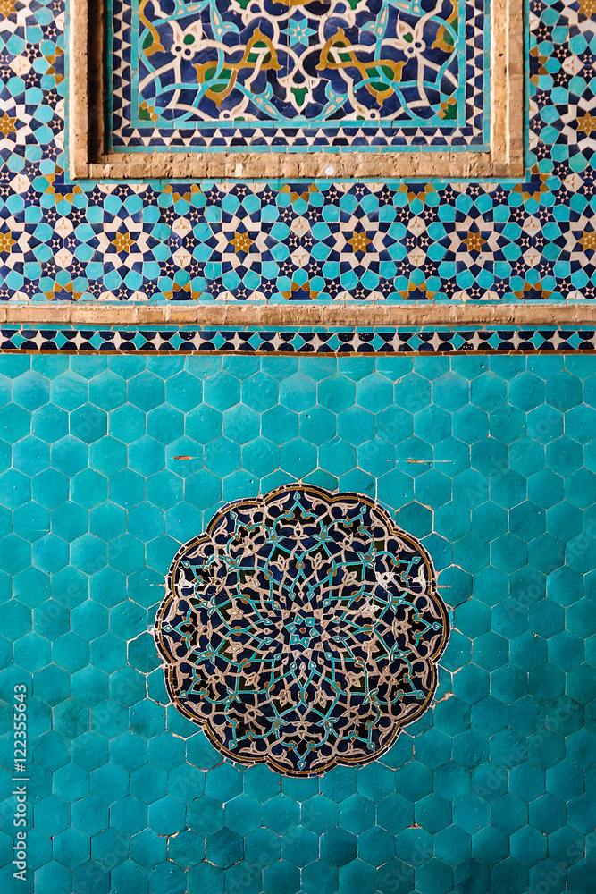 Blue arabesque Islamic geometric patterns inside an old mosque in Yazd ...