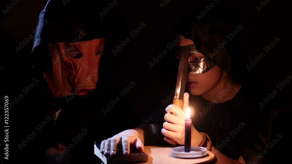 Satanic priests - pig and druid - performing dark ritual. 4K UHD Stock ...