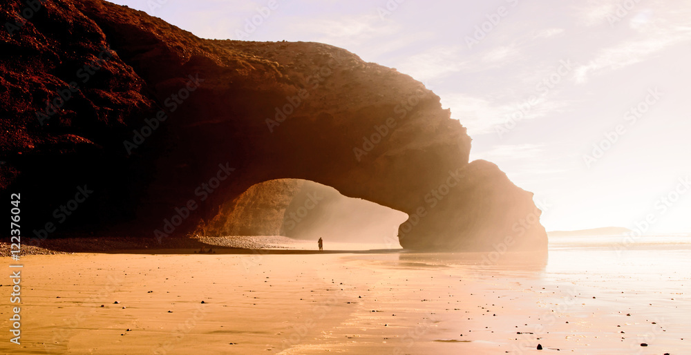 Travel and vacation in Morocco. Amazing natural arches on Legzira beach ...