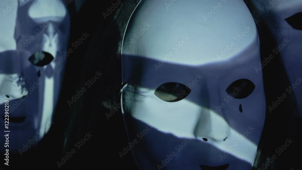 An evil man (a crazy maniac, a psycho killer) wearing a scary bunny ...