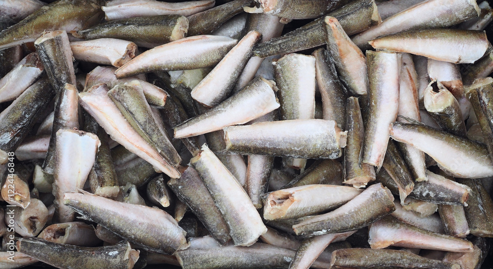 Frozen tadpole codling fish on a fish market, view from top, fits as ...