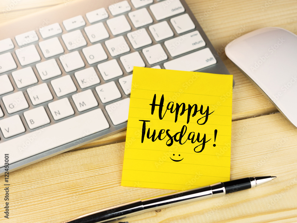 Happy Tuesday on sticky note on work desk Stock Photo | Adobe Stock