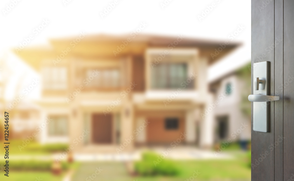 opened wooden door to modern home exterior as background Stock Photo ...