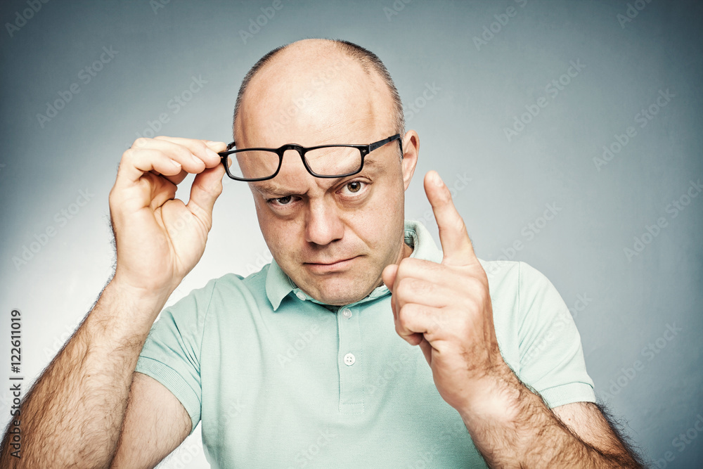 Closeup portrait of angry grumpy middle-aged man looking from un Stock ...