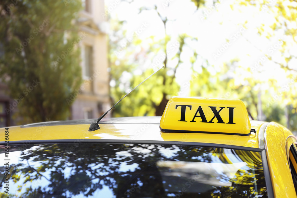 Yellow taxi sign on car roof Stock Photo | Adobe Stock