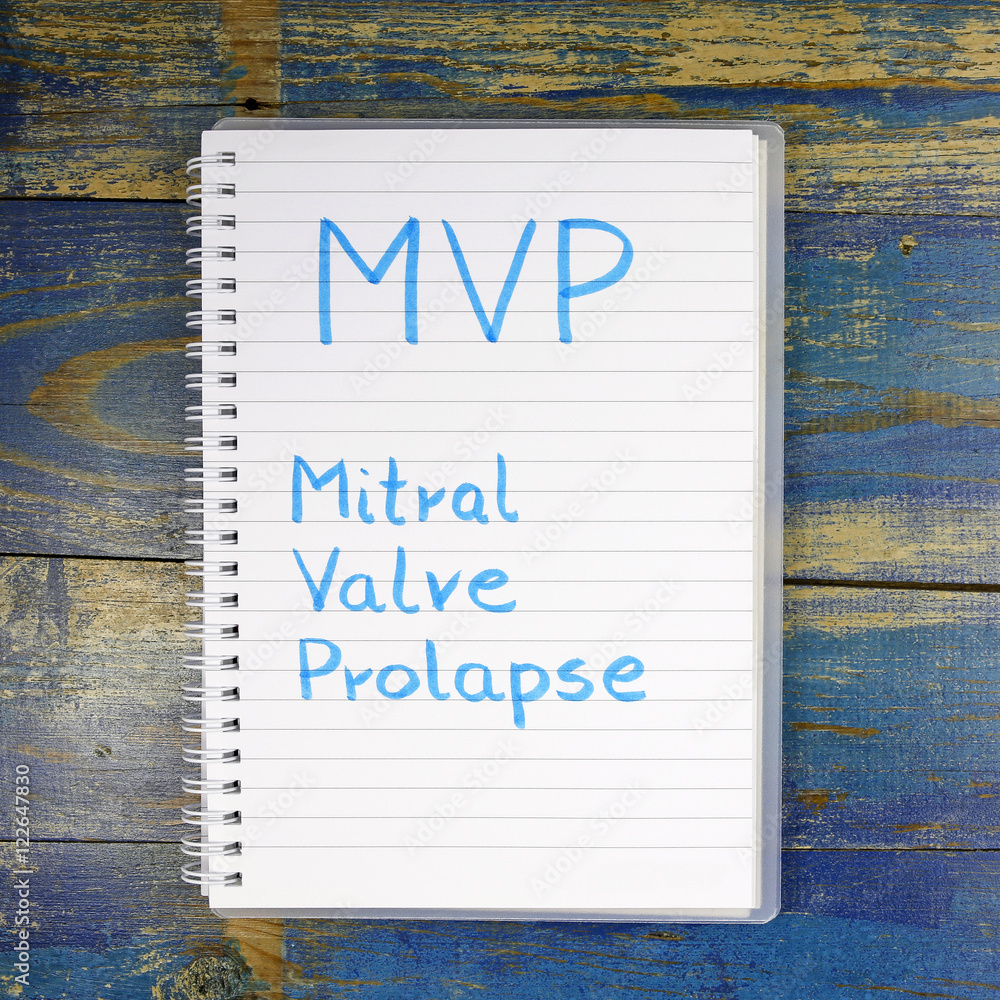MVP- Mitral Valve Prolapse written in notebook on wooden background ...
